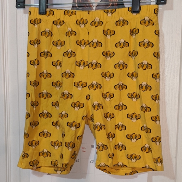 Disney | Shorts | Disney Lion King Young Simba Faces Yellow Biker ...